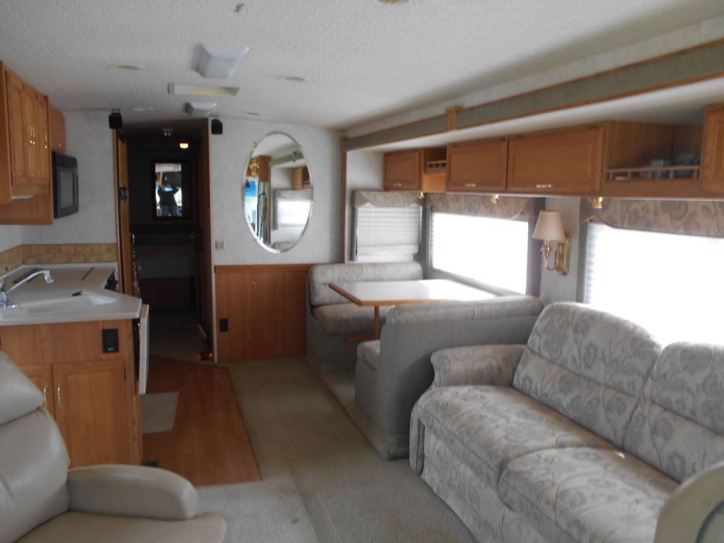 A 2003 Winnebago Adventurer 35U is our New Home On Wheels!